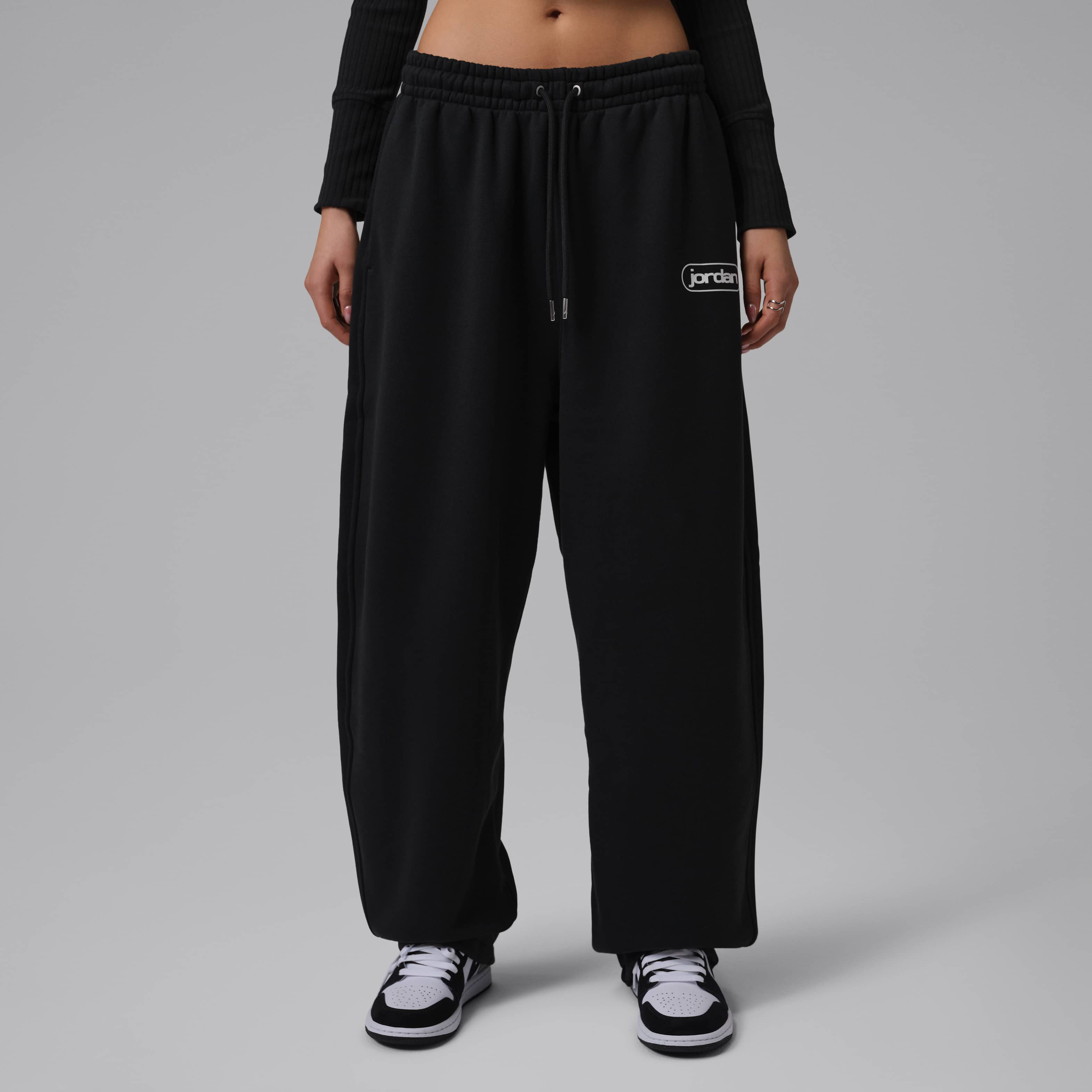 Buy Jordan Flight Fleece Women's Baggy Trousers - Black/Sail @ Nike Saudi