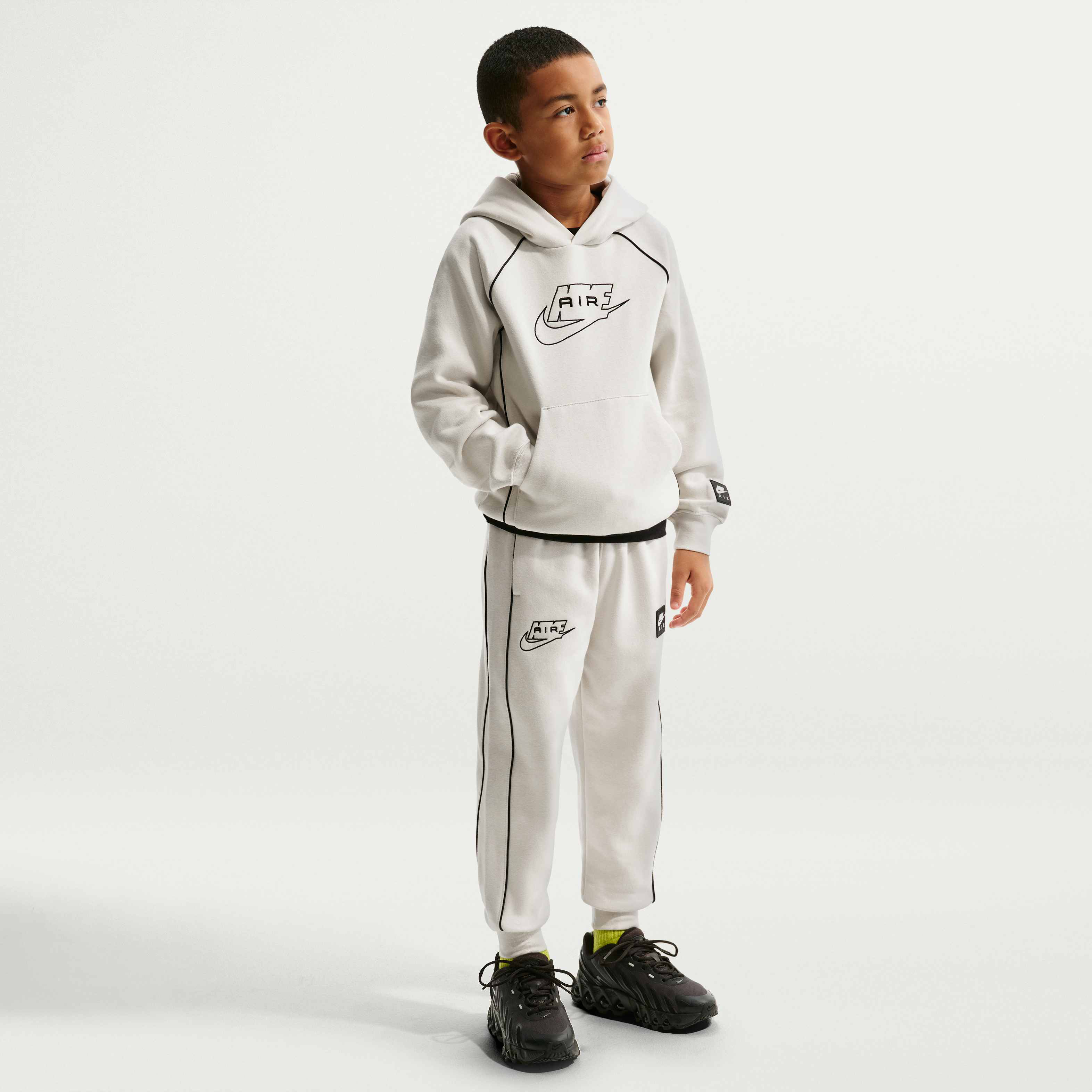 Buy Nike Air Older Kids' Fleece Joggers - Light Bone/Black/Black @ Nike ...