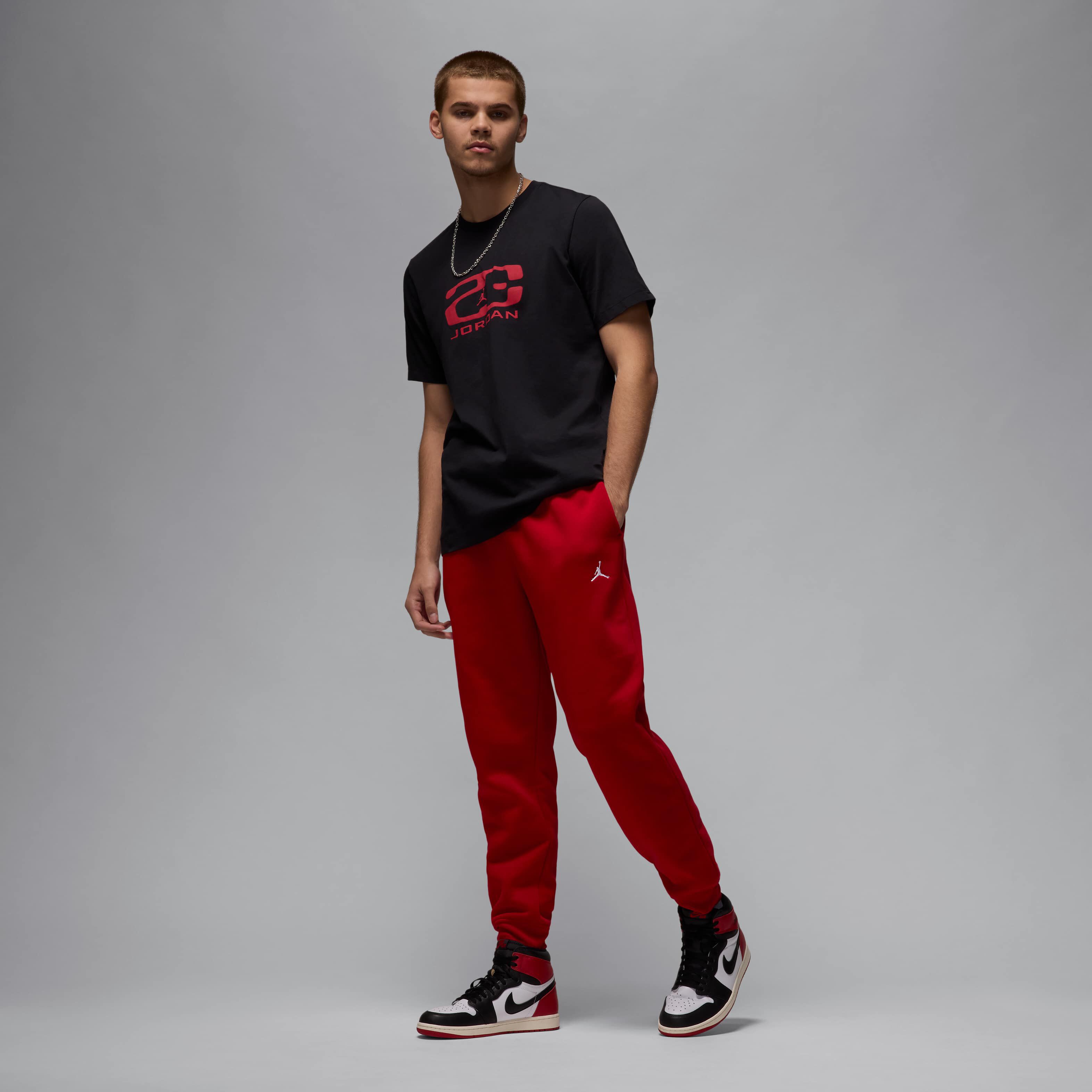 Buy Jordan Flight Essentials Men's T-Shirt - Black/Varsity Red @ Nike Saudi